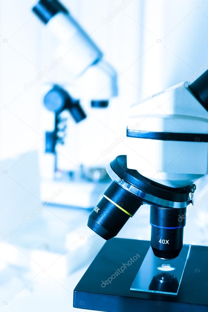 Laboratory microscope lens Stock Photo by ©Alex011973 31409225
