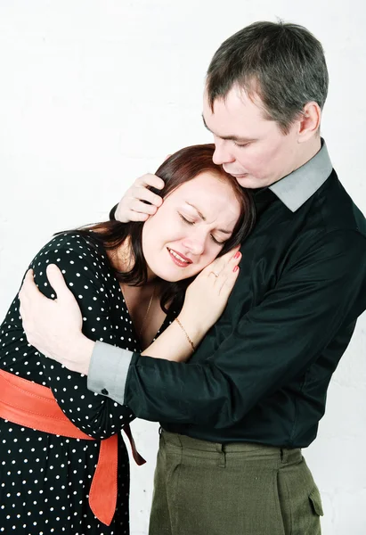 Woman comforting her crying man — Stock Photo © DarkBird #17654985