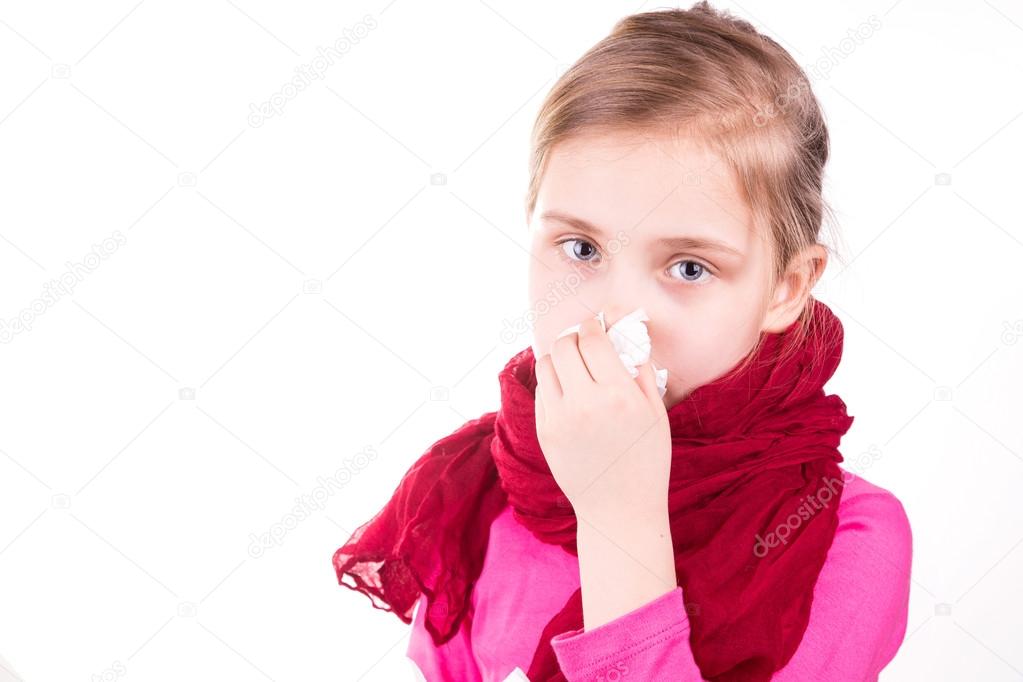 Sick little girl sneezing with napkin Stock Photo by ©Len44ik 23652475