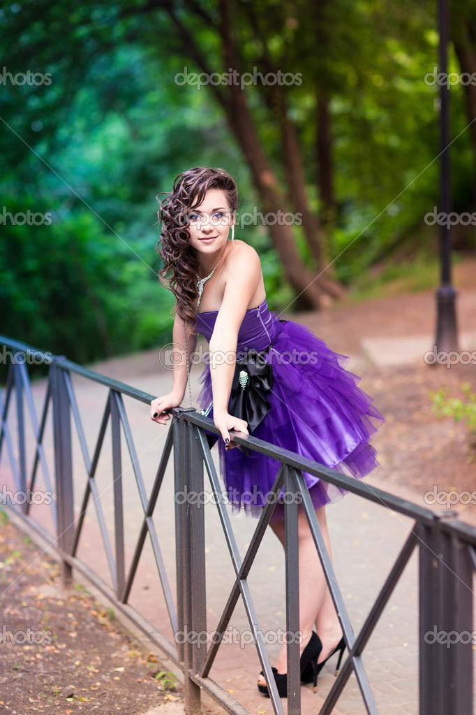 Beautiful young girl in a beautiful dress outdoor — Stock Photo © Len44ik #26439081
