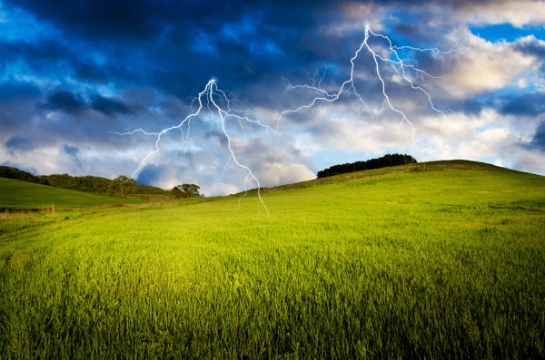 Lightning storm field Stock Photos, Royalty Free Lightning storm field ...
