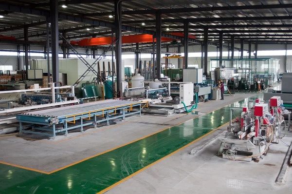 Factory workshop Stock Photo by ©zhanglianxun 19460391