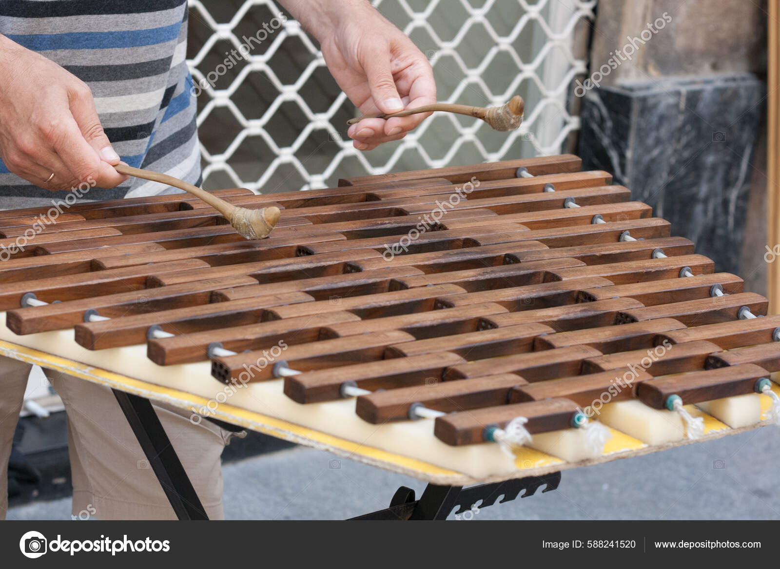 Man Hand Holding Wooden Sticks — Stock Photo © arualesteban #588241520 Man Hand Holding Wooden Sticks — Stock Photo © arualesteban #588241520