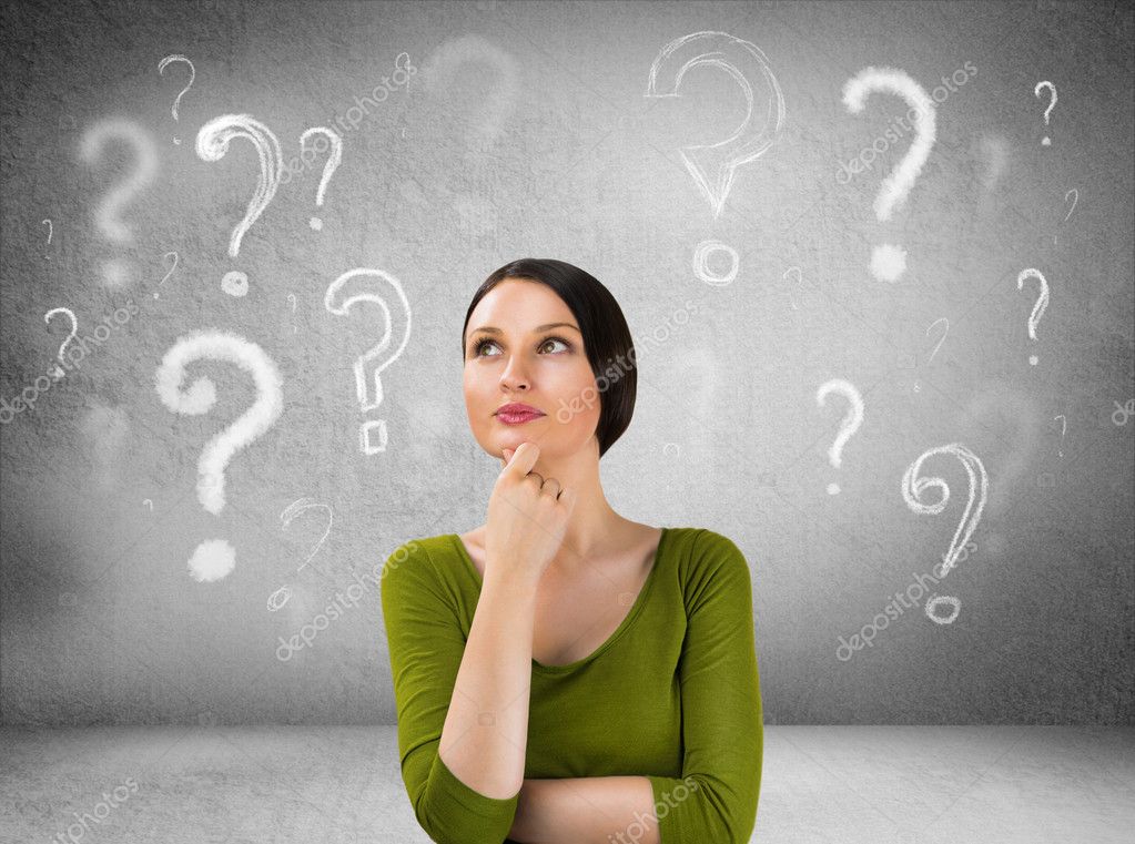Beautiful woman with questioning expression and question marks a ...