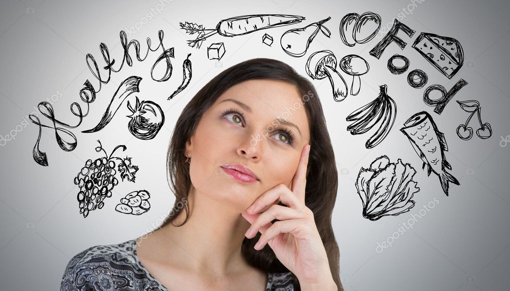 Young pretty woman thinking of healthy food closeup face portrait Stock ...