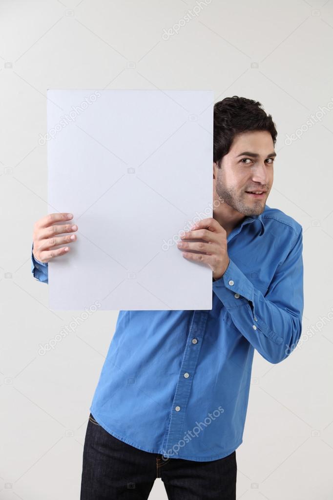 Man hiding behind the card Stock Photo by ©eskaylim 12640106