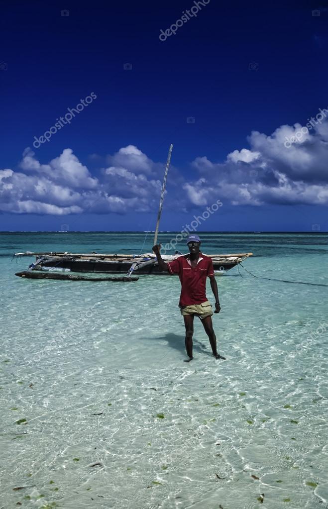 Kenya, Indian ocean, Malindi, local fishing boats in shallow water ...