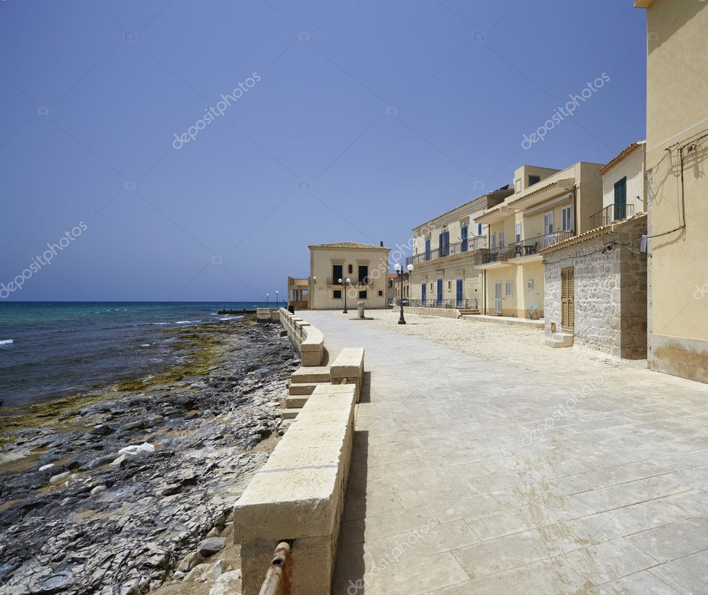 Old buildings on the seafront — Stock Photo © agiampiccolo #51505347