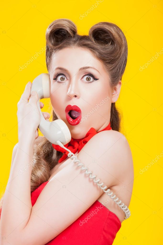 Pin-up girl talking on retro telephone Stock Photo by ©Meggan 30580529