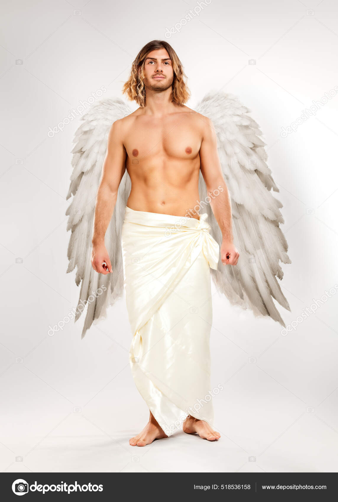 Hombre guapo ángel. Aislado sobre fondo blanco. — Foto de stock ...