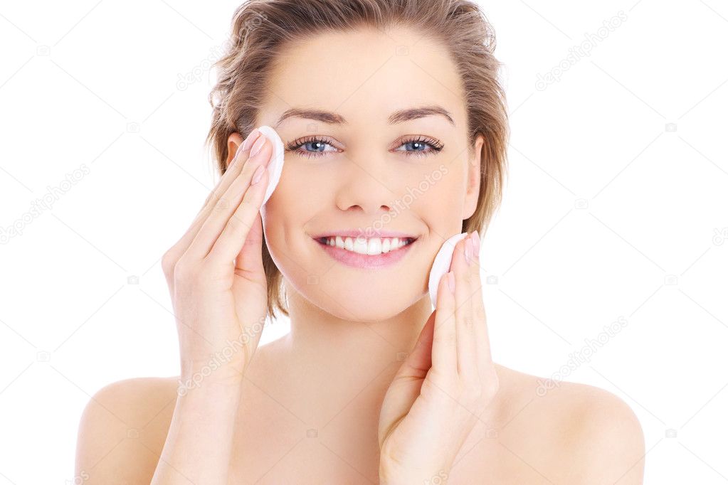 Woman cleaning face — Stock Photo © macniak #42391353