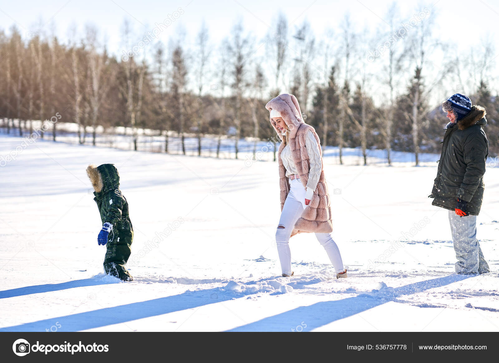 Nice happy family having fun on winter snow Stock Photo by ©macniak ...