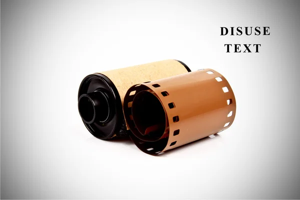 Old camera and film strip isolated Stock Photo by ©vladek 18640615