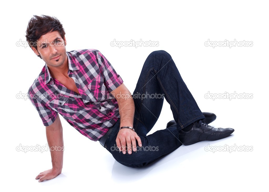 Handsome guy sitting on the floor Stock Photo by ©kalozzolak 16084245