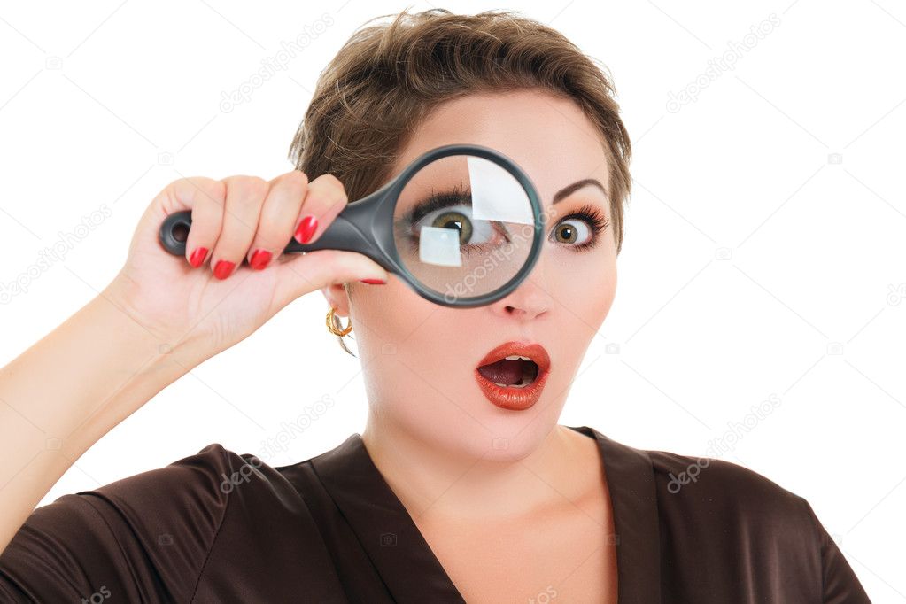 Beautiful woman looking through a magnifying glass Stock Photo by ...