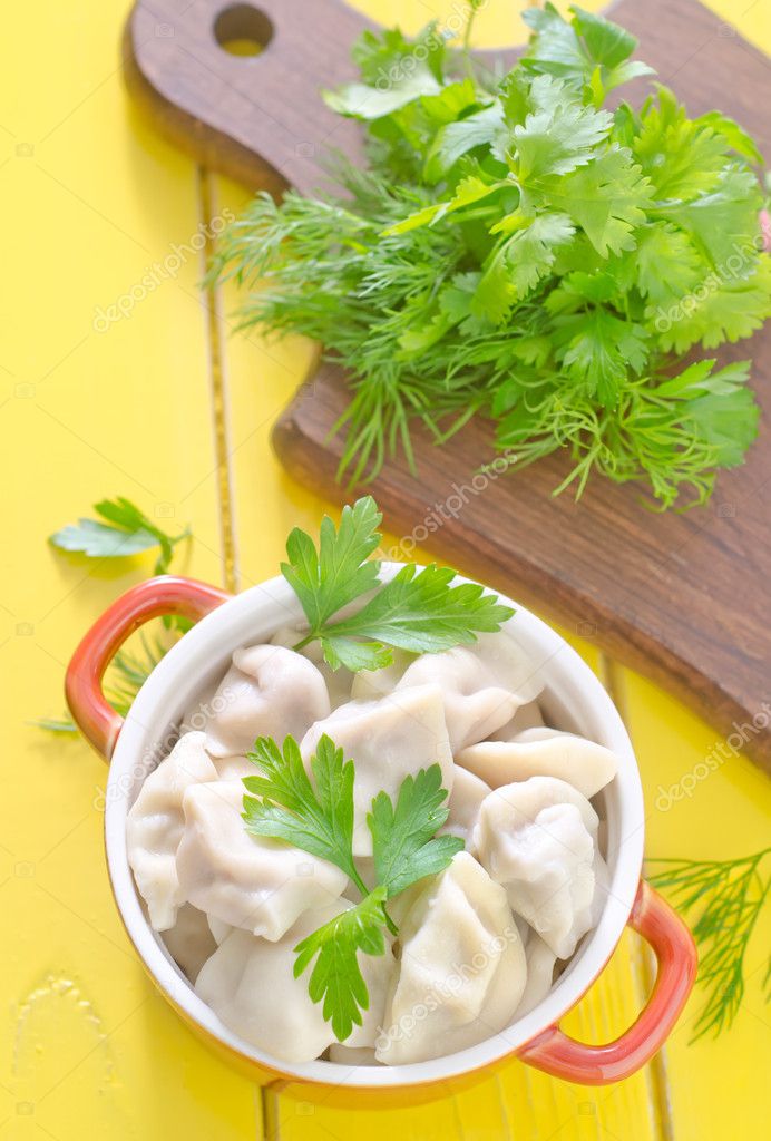 Pelmeni with parsley Stock Photo by ©tycoon 32641319