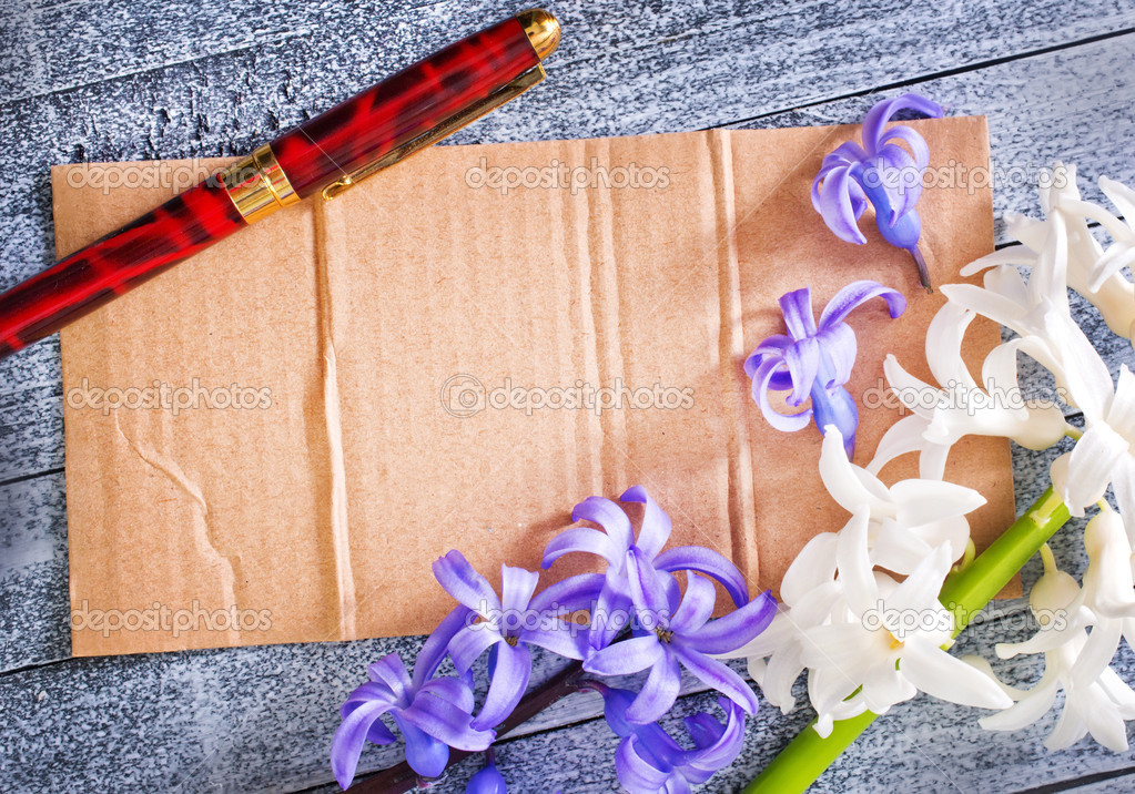 Note and flowers Stock Photo by ©tycoon 43696371