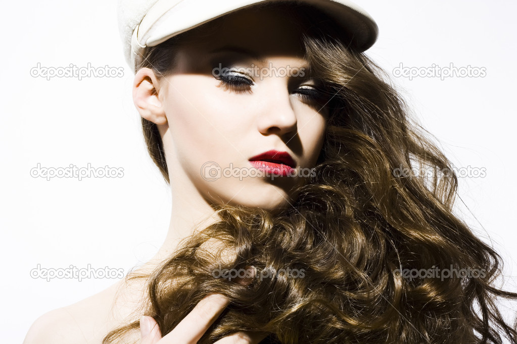 Beautiful young model in hat Stock Photo by ©dpaint 18450043