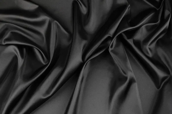 Black silk fabric Stock Photo by ©stillfx 141047620