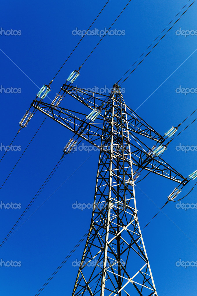 Electricity pylon against the light — Stock Photo © ginasanders #39263923