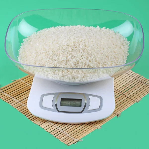 Wooden bowl with rice and chopsticks — Stock Photo © IngridsI #2347138