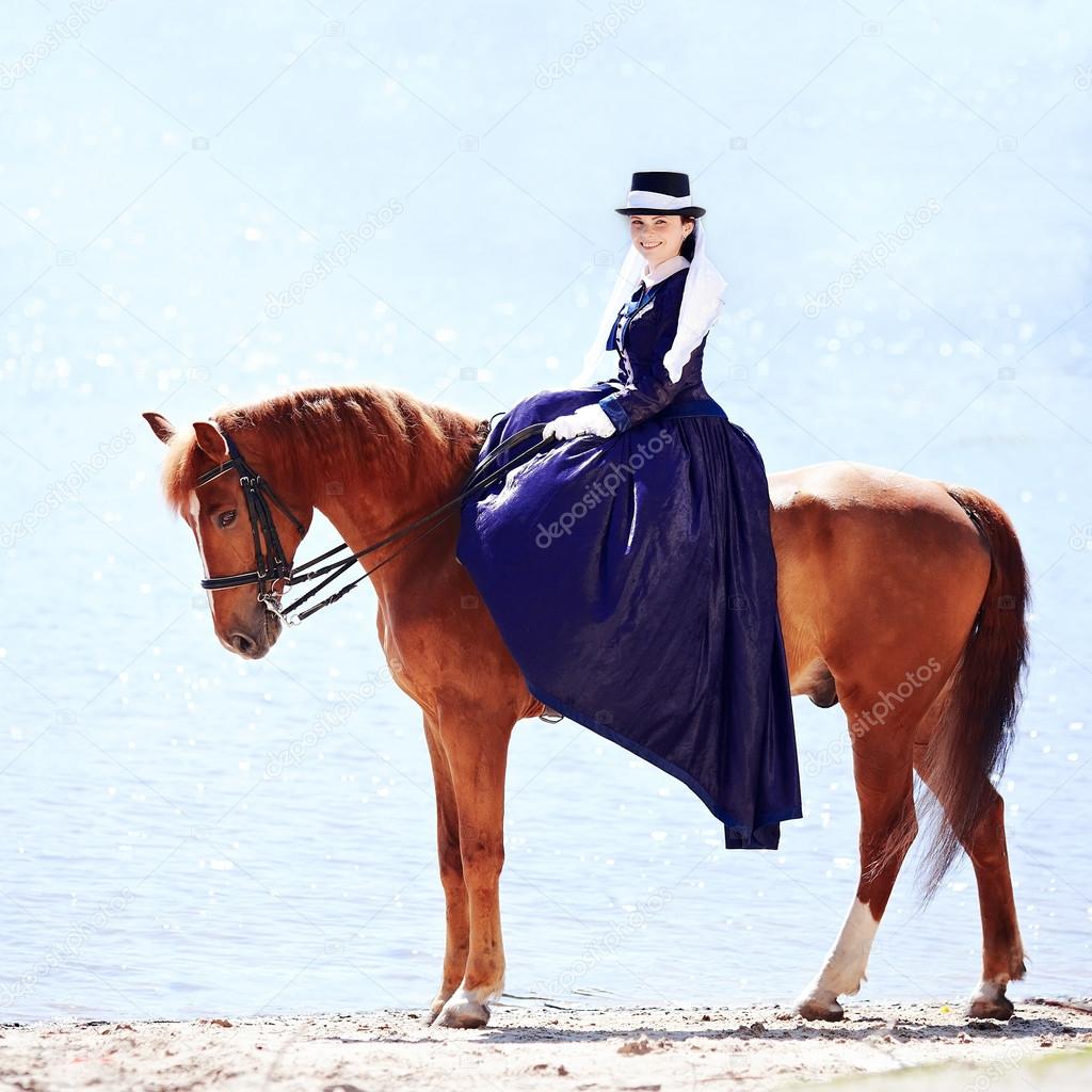 The lady on riding walk. Stock Photo by ©Azaliya 48135719