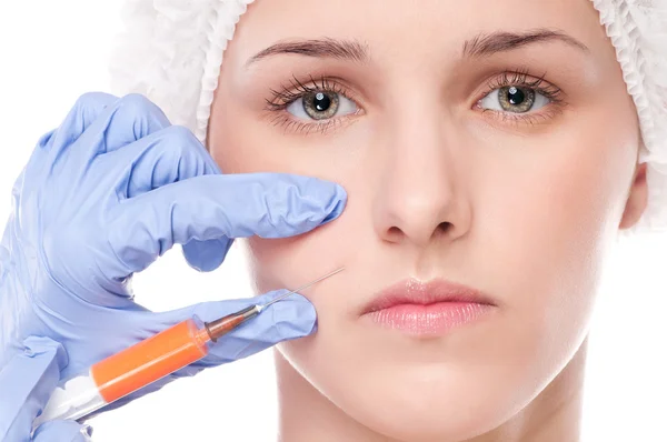 Cosmetic botox injection in face Stock Photo by ©markin 19981049