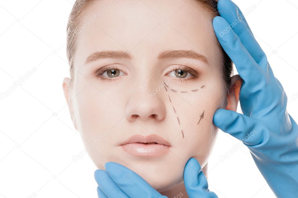 Beautician draw correction lines on woman face — Stock Photo © markin ...