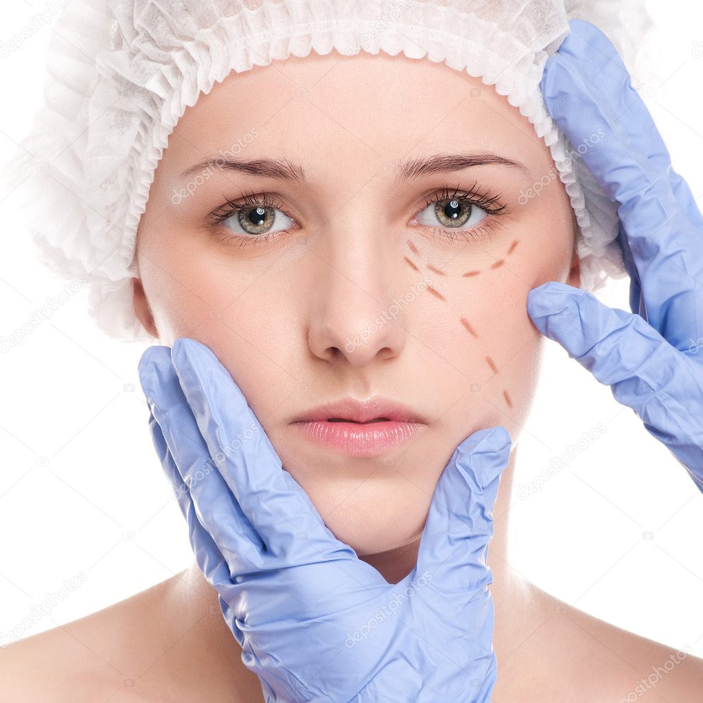 Beautician draw correction lines on woman face Stock Photo by ©markin ...