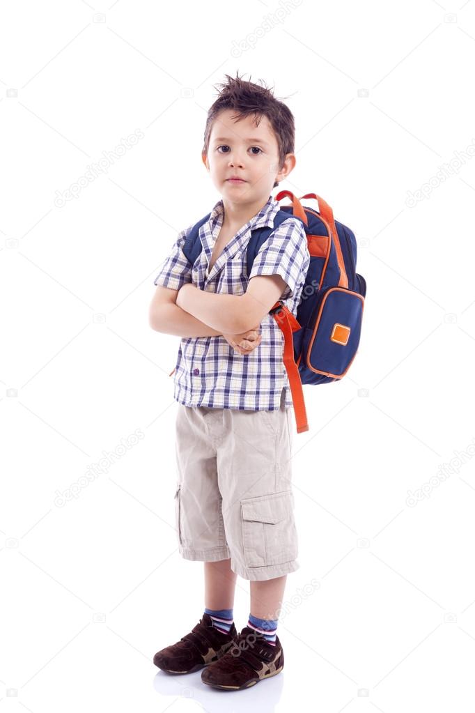 Smiling school kid standing with arms crossed Stock Photo by ©cristovao ...