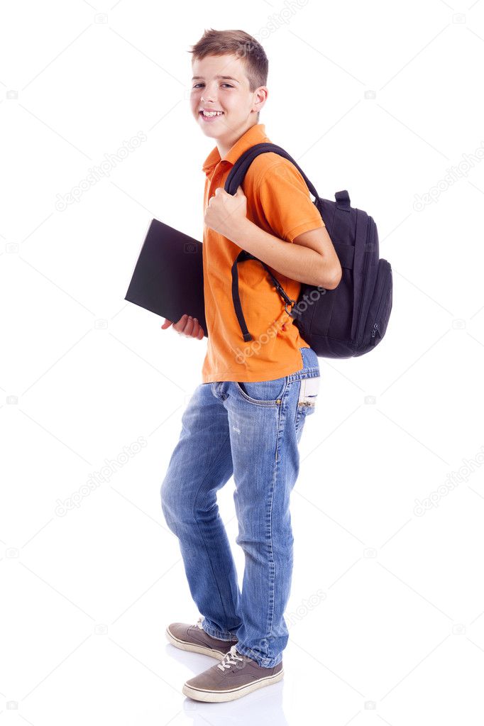 Portrait of a smiling school boy with backpack holding a notebook ...