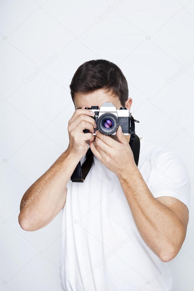 Man using retro camera Stock Photo by ©cristovao 51299429