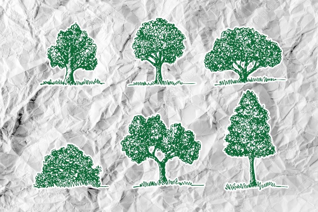 Set of trees with leaves on crumpled paper — Stock Photo © porjai #42601757