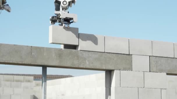 Automated machine. Smart robotic. Automation.Cinder block wall. Facade ...