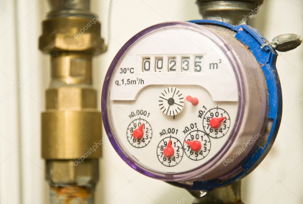 Old water meter on the pipe Stock Photo by ©badahos 14107810