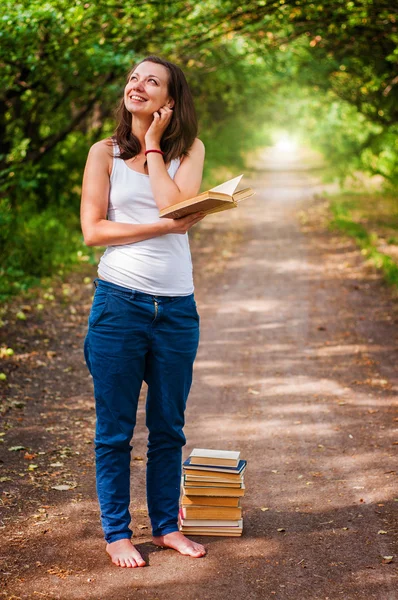 Walking with book Stock Photos, Royalty Free Walking with book Images ...