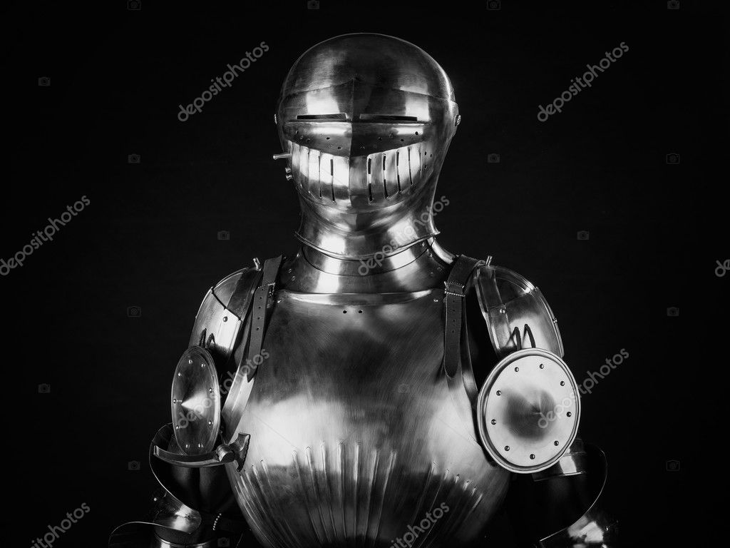 Knight in metal armor Stock Photo by ©badahos 50007233