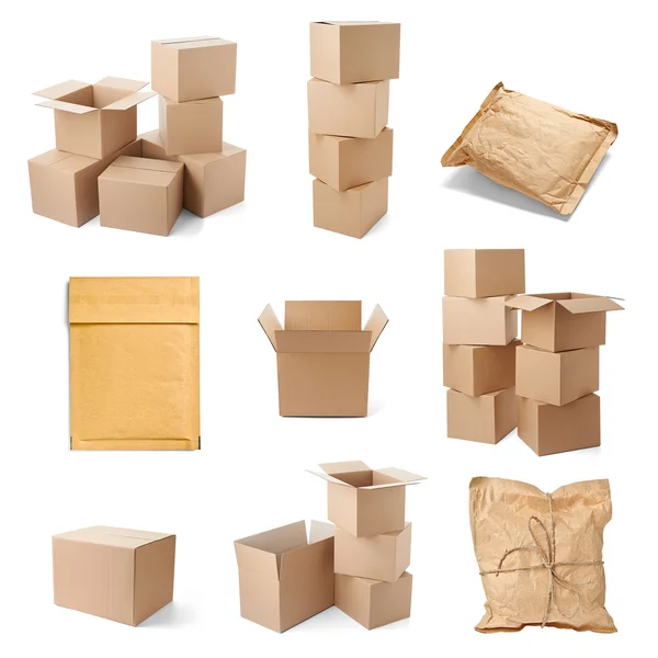 Stacks of cardboard boxes isolated on white background — Stock Photo © photkas #22869726
