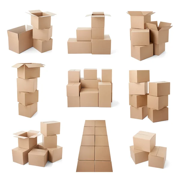 Stacks of cardboard boxes isolated on white background — Stock Photo © photkas #22869726