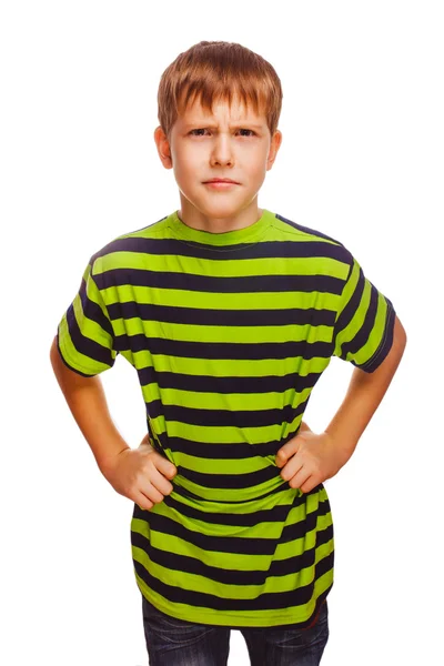 Angry child teenage boy experiencing anger blonde in a striped s ...