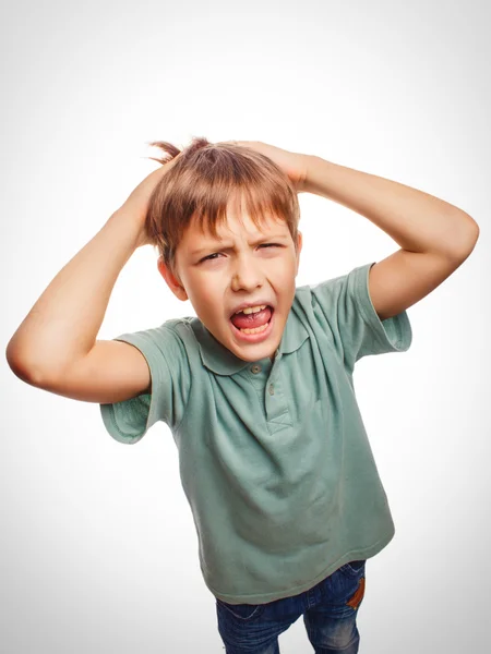 Boy child upset angry shout produces evil face portrait isolated ...