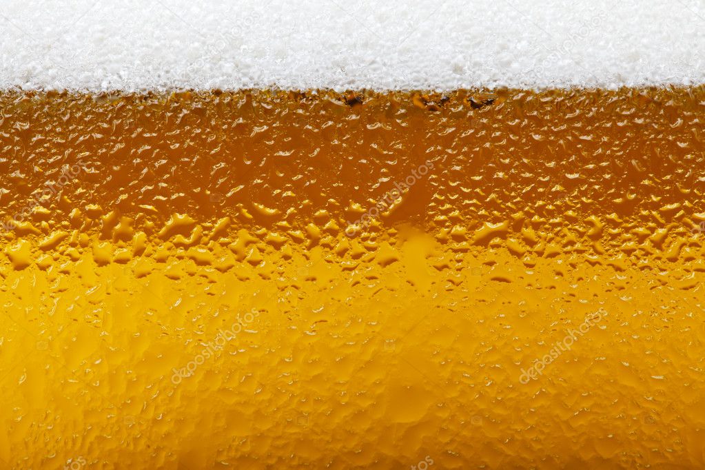 Close-up picture of a beer with foam and bubbles — Stock Photo ...