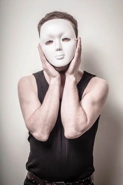 Man with mask. Stock Photo by ©hannamonika 14073849