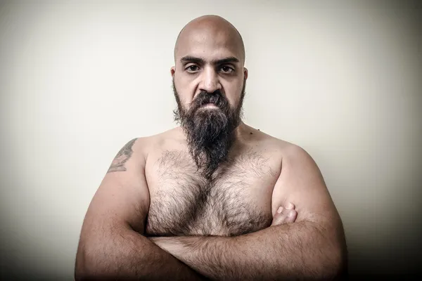 Super power angry muscle bearded man - Stock Image - Everypixel
