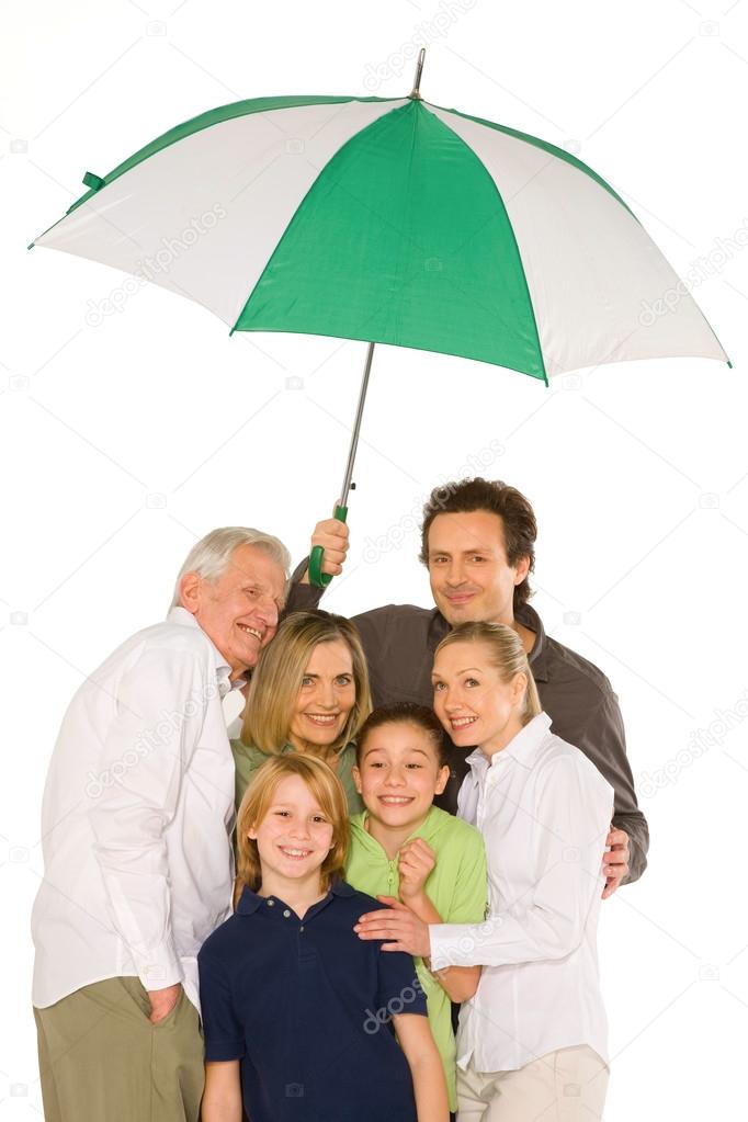Three generations family standing isolated on white background h ...
