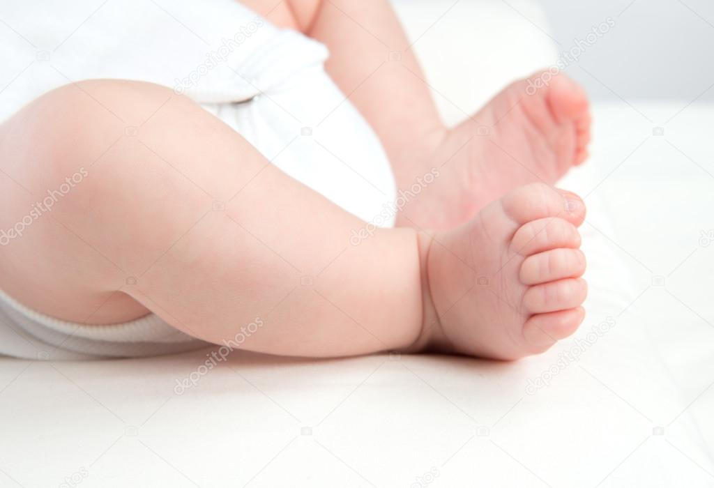 One month new born child baby foot legs — Stock Photo © dml5050 #26796809