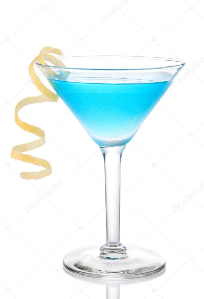 Blue tropical martini cocktail with yellow lemon spiral Stock Photo by ...