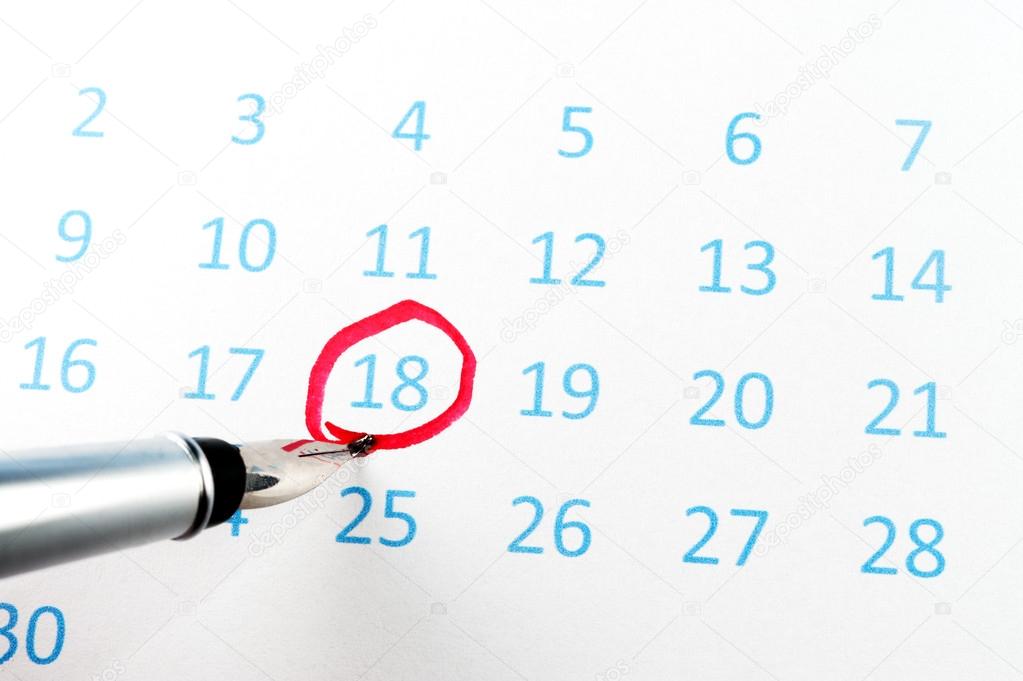 Red circle on calendar — Stock Photo © raywoo #27579015