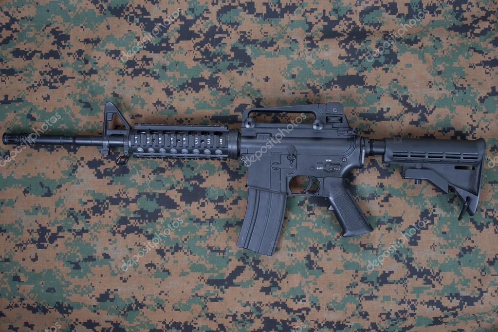 M4 carbine on us marines camouflage uniform ⬇ Stock Photo, Image by ...