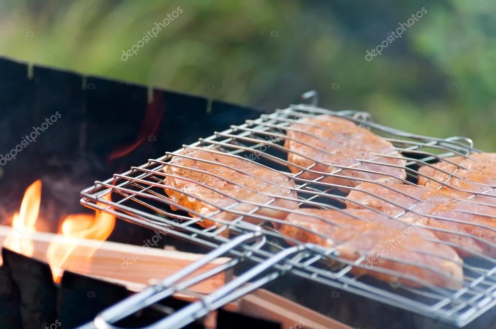 Meat fried on the grill — Stock Photo © Tanchic #34026309